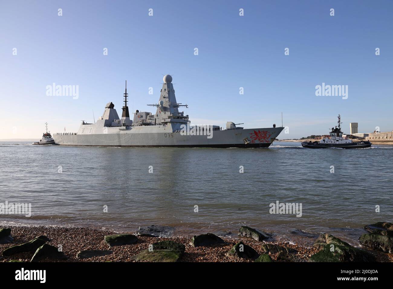 The Royal Navy Type 45 Daring class destroyer HMS DRAGON passing close ...