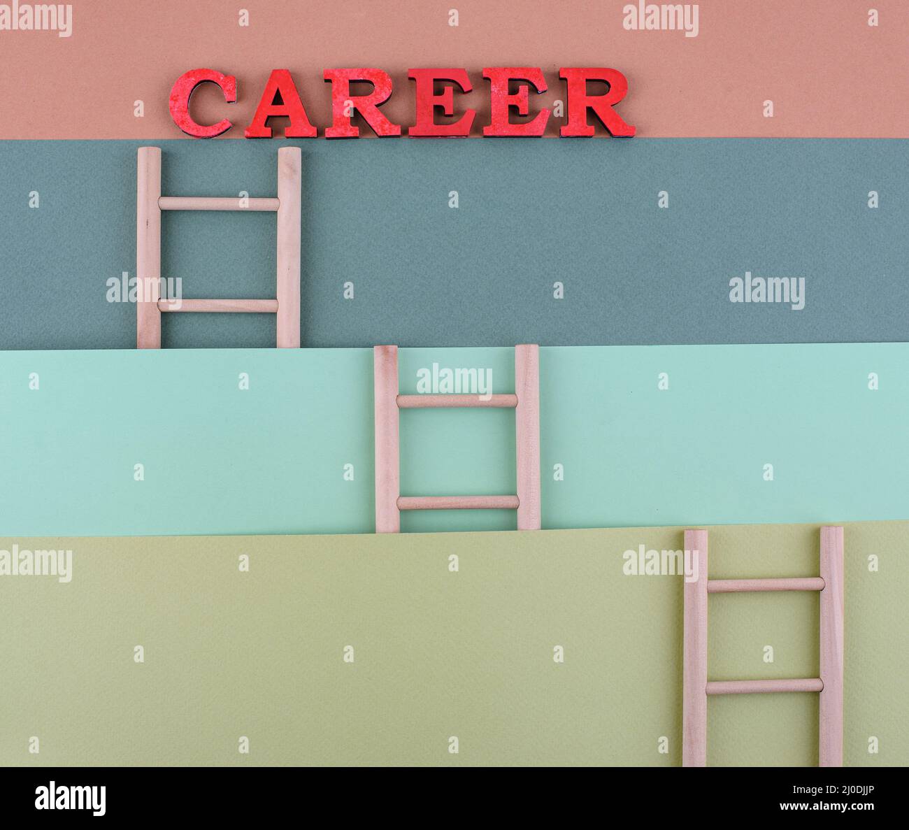 Career ladder concept with wooden stairs Stock Photo - Alamy