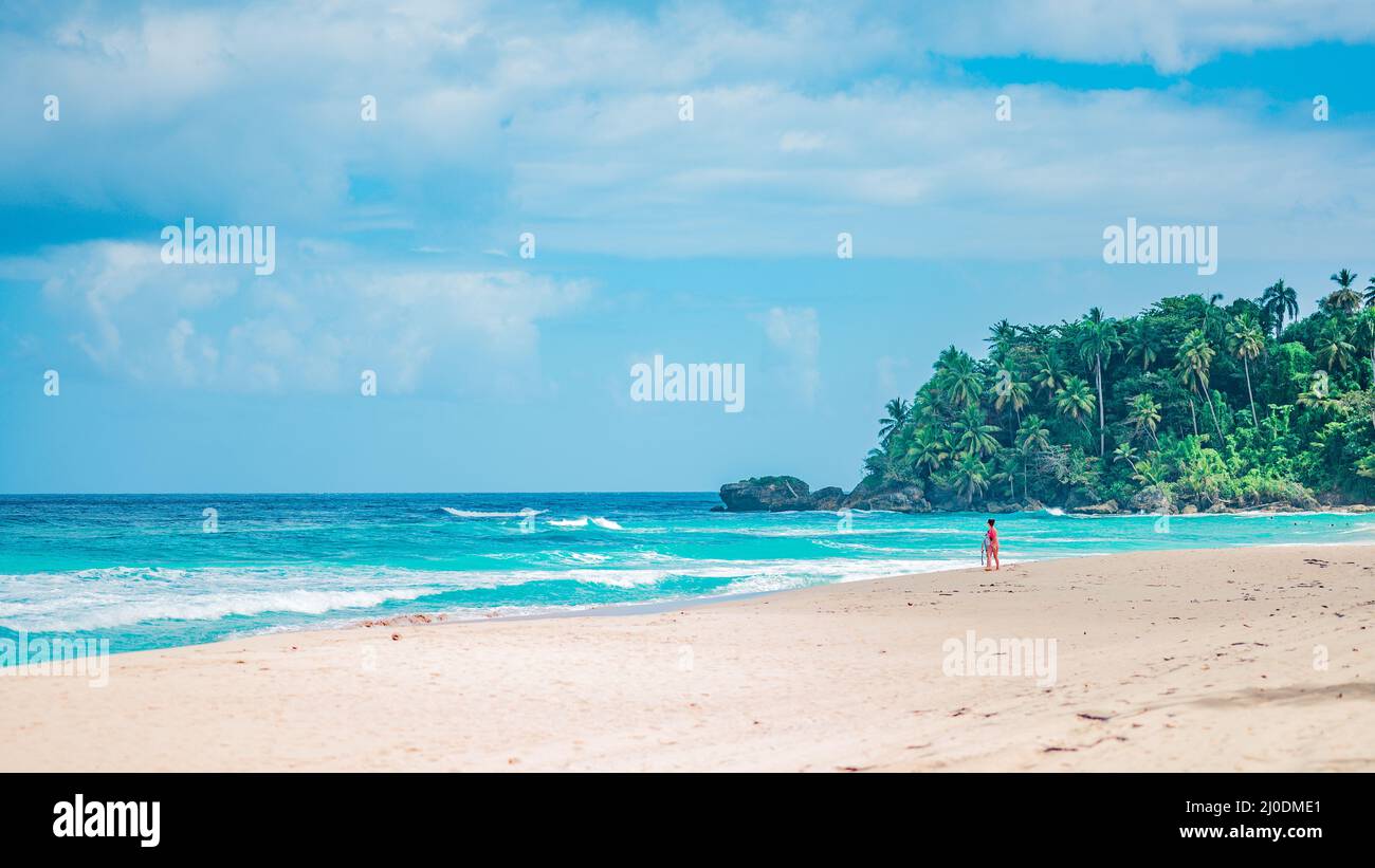 Photo of a sandy beach in the foreground from the Dominican Republic ...