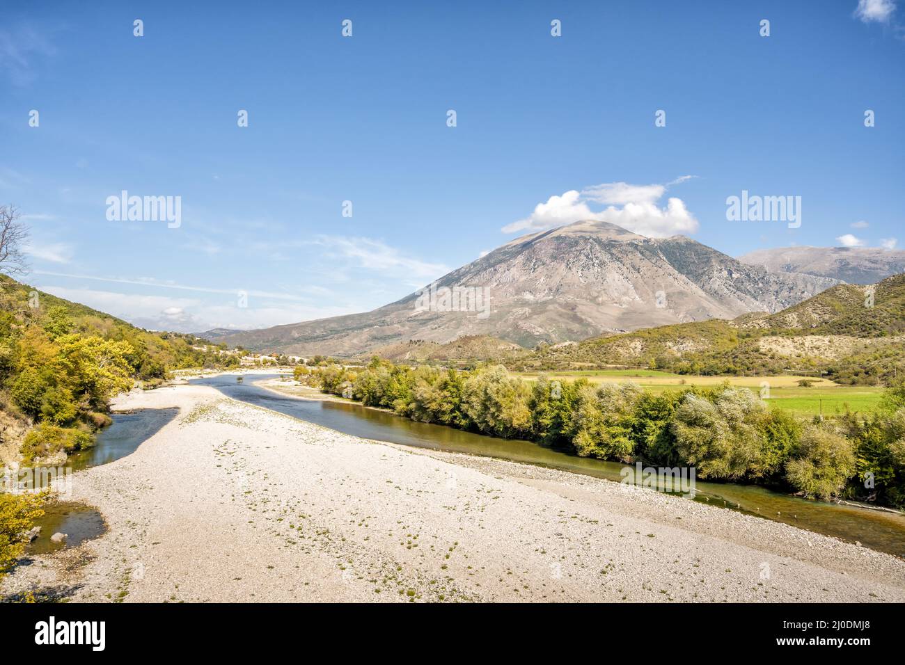 Beautiful mountain valley with gentle hills and river Stock Photo - Alamy