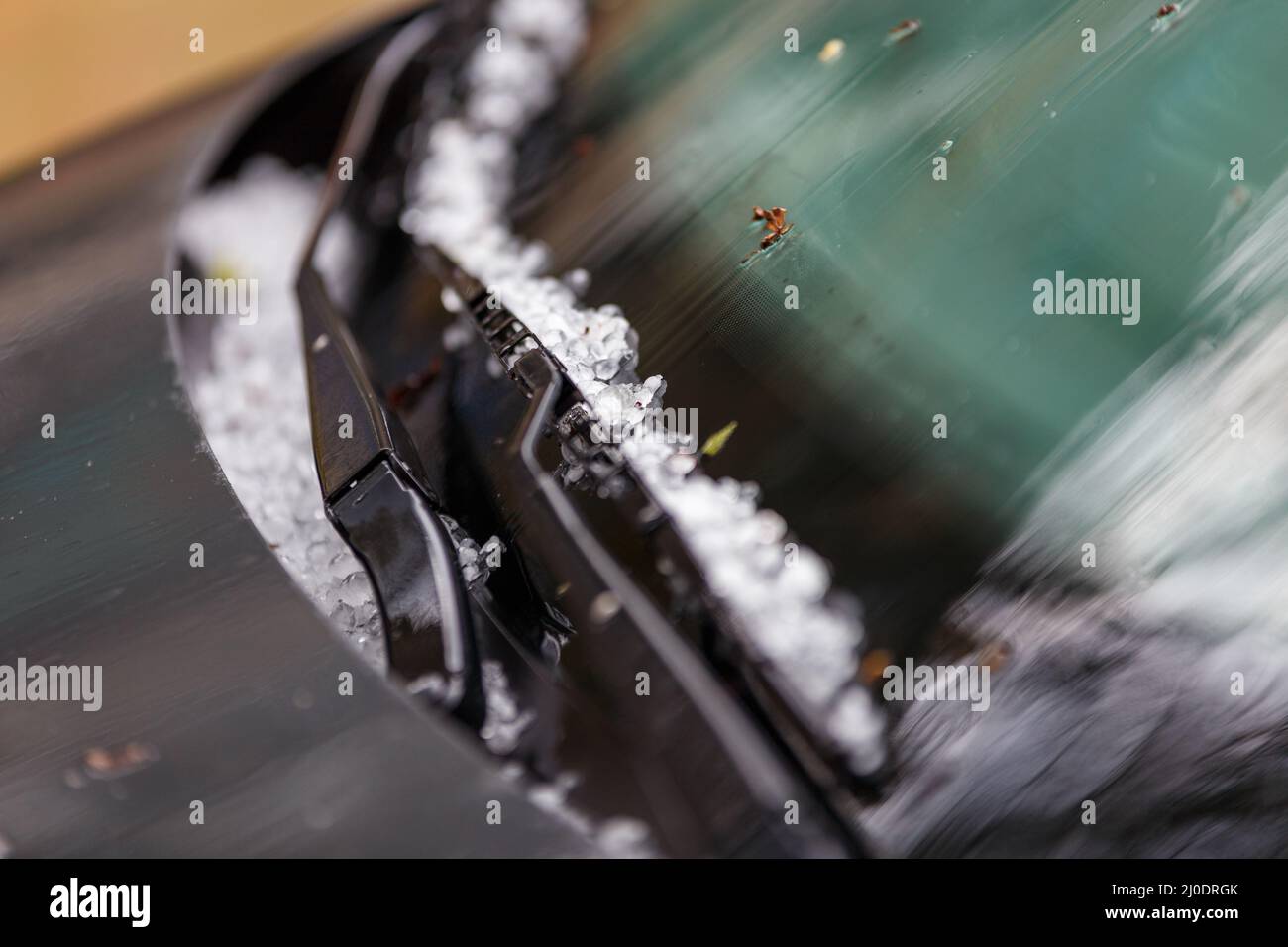 small hail ice balls on black car hood after heavy summer storm Stock ...
