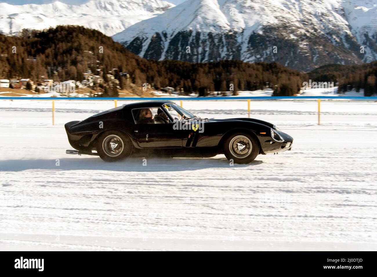 Classic vintage antique sports cars racing on the frozen lake of St ...