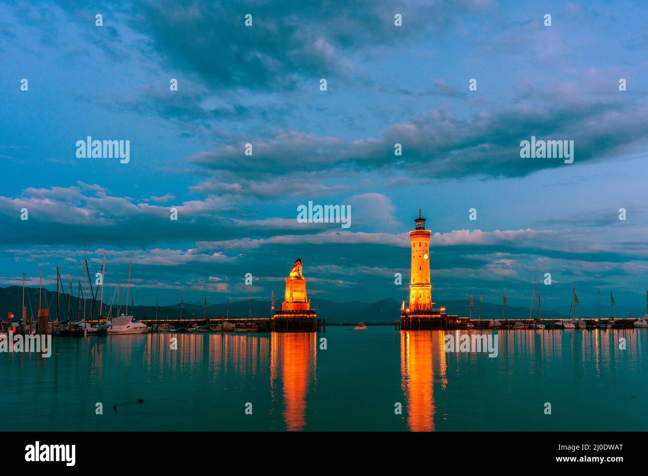 View of the harbor entrance and lighthouse in Lindau on Lake Constance ...