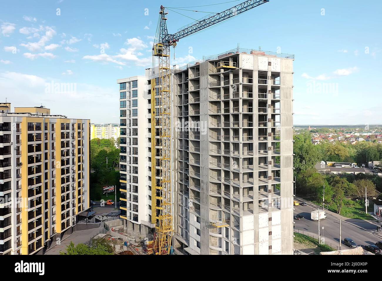 Aerial view of high residential apartment building under construction ...