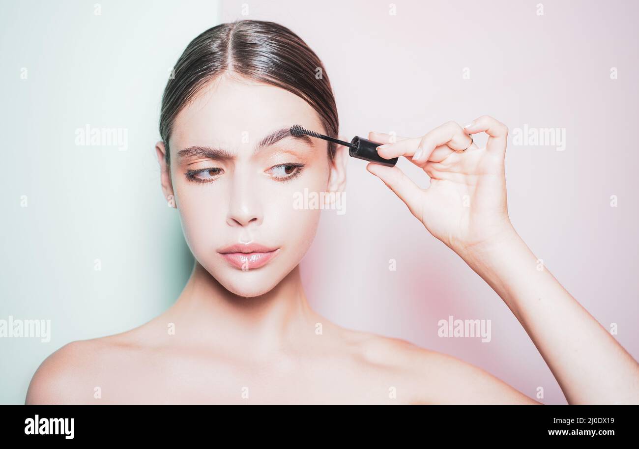 Beauty routine. Girl hold cosmetic applicator. Woman put makeup on her ...