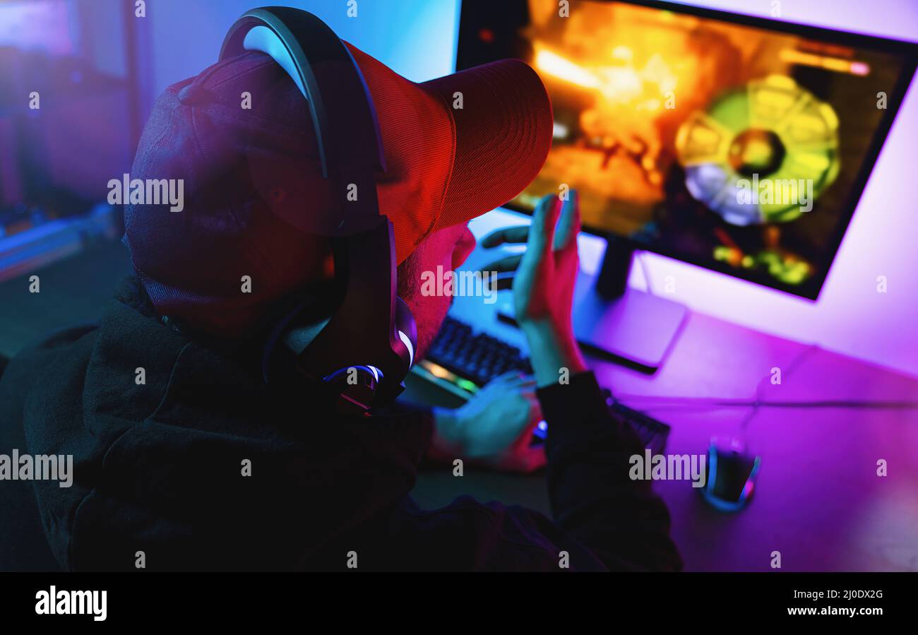 Professional Gamer pointing and Playing in First-Person Shooter Online ...