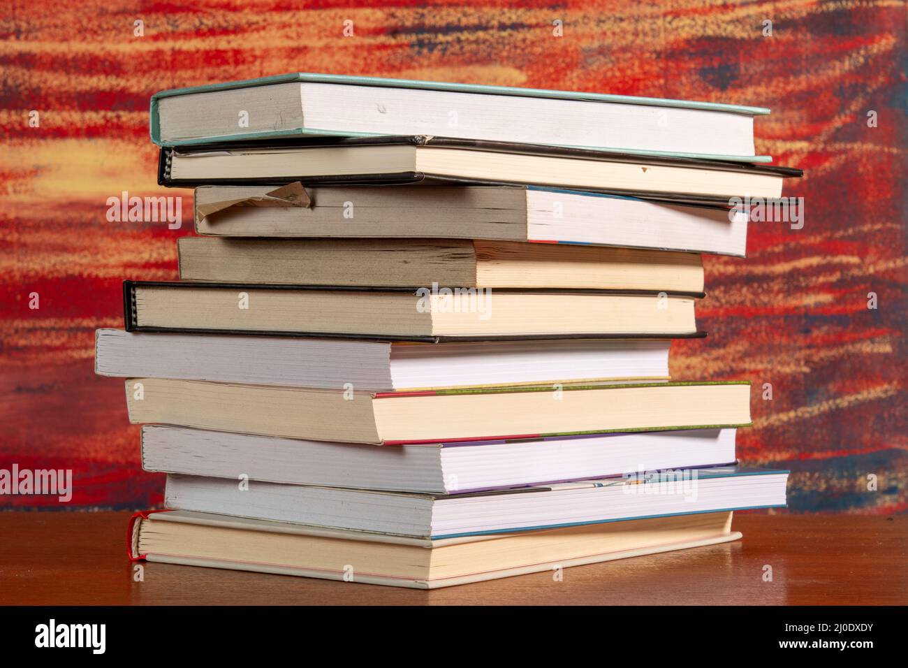 Close-up of background stack of old used books. Pile of vintage old ...