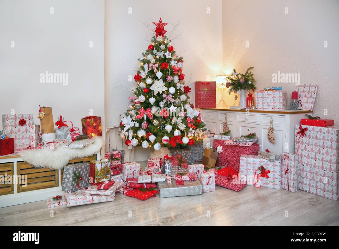 Christmas tree in living room Stock Photo - Alamy