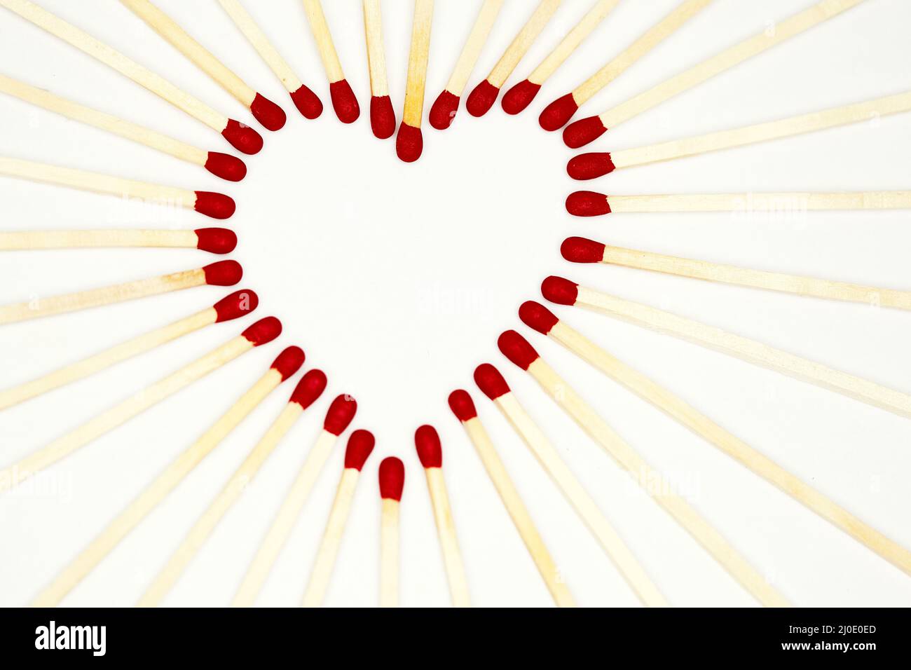 Heart symbol with matches Stock Photo - Alamy