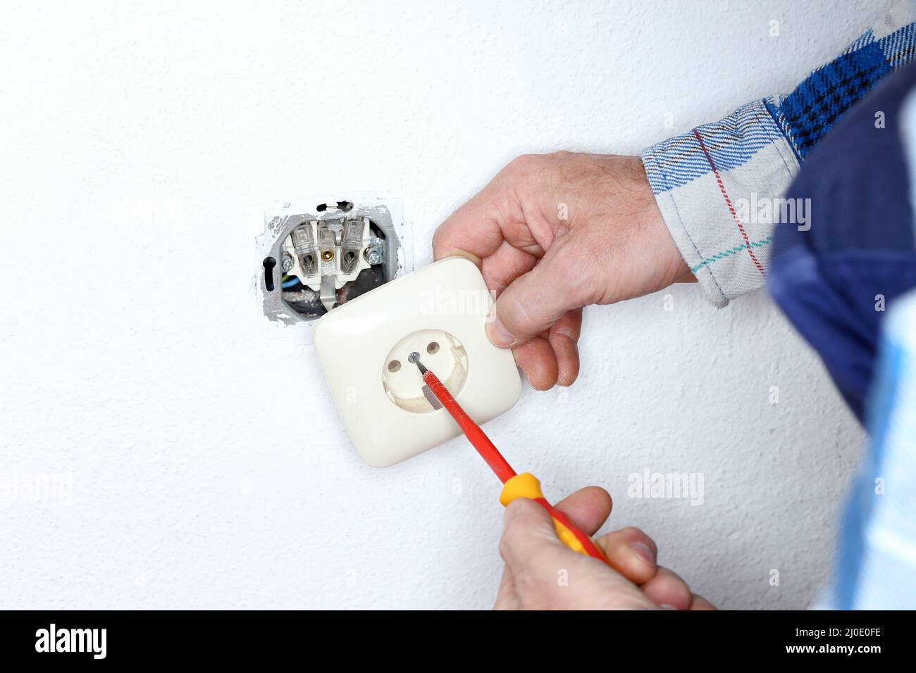 Broken electricity socket hi-res stock photography and images - Alamy