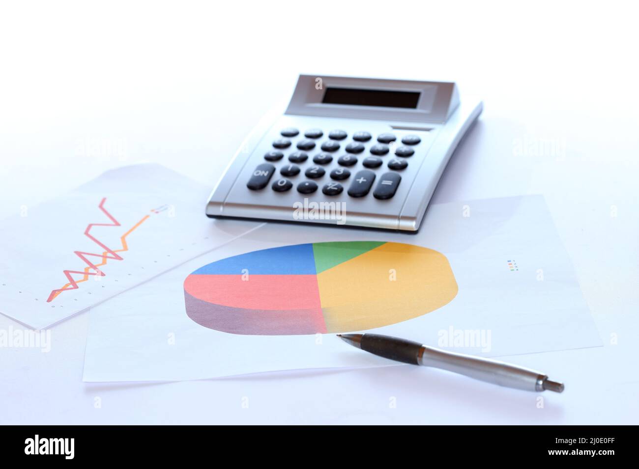 Different diagrams with calculator Stock Photo - Alamy