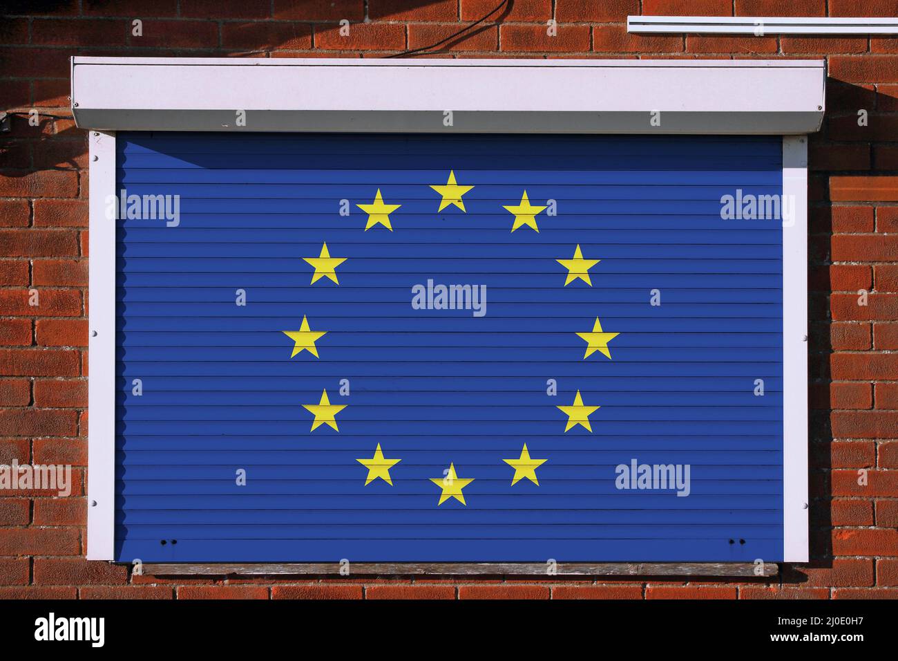 European flag on closed security shutters Stock Photo - Alamy