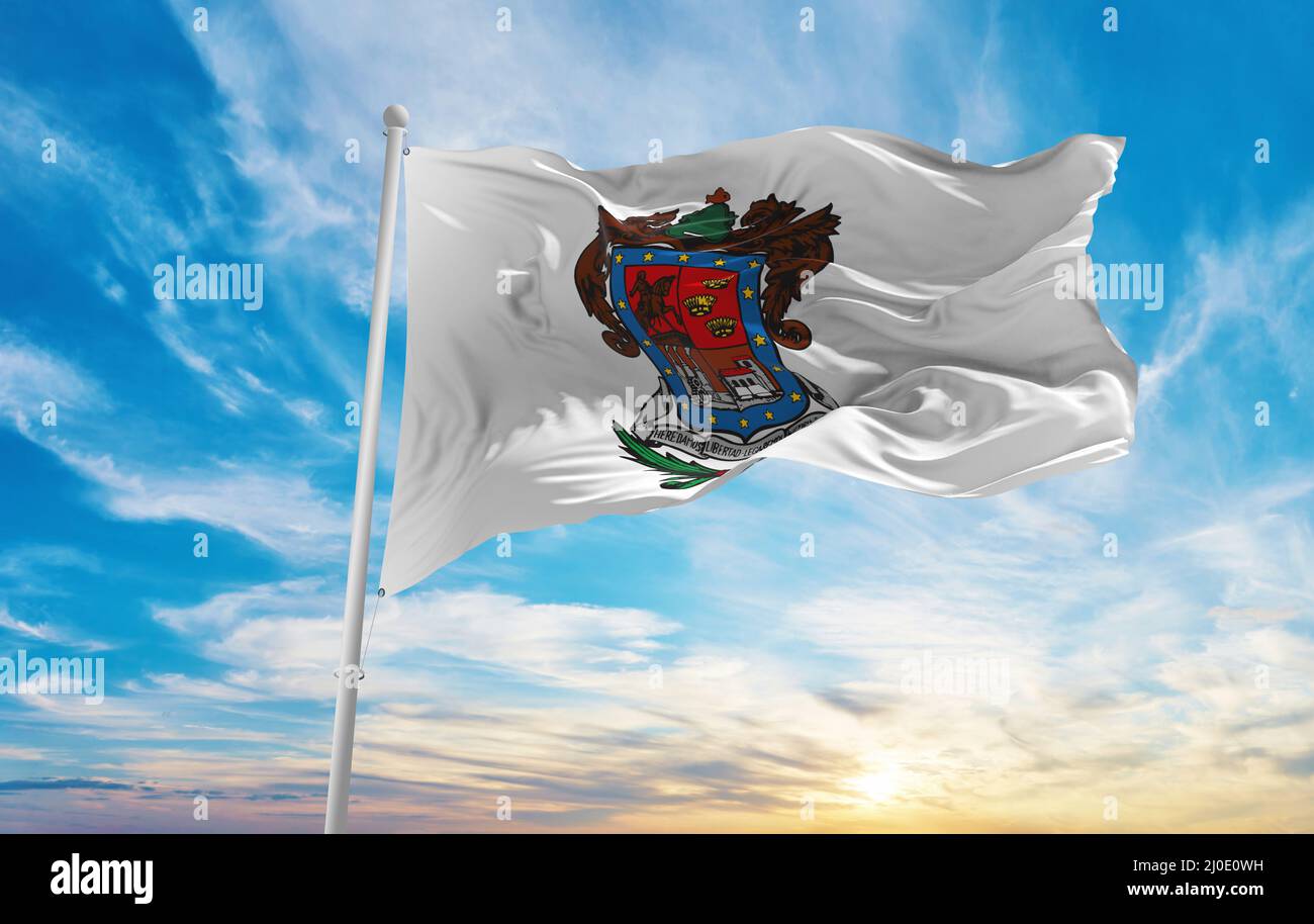 flag of Michoacan , Mexico at cloudy sky background on sunset ...