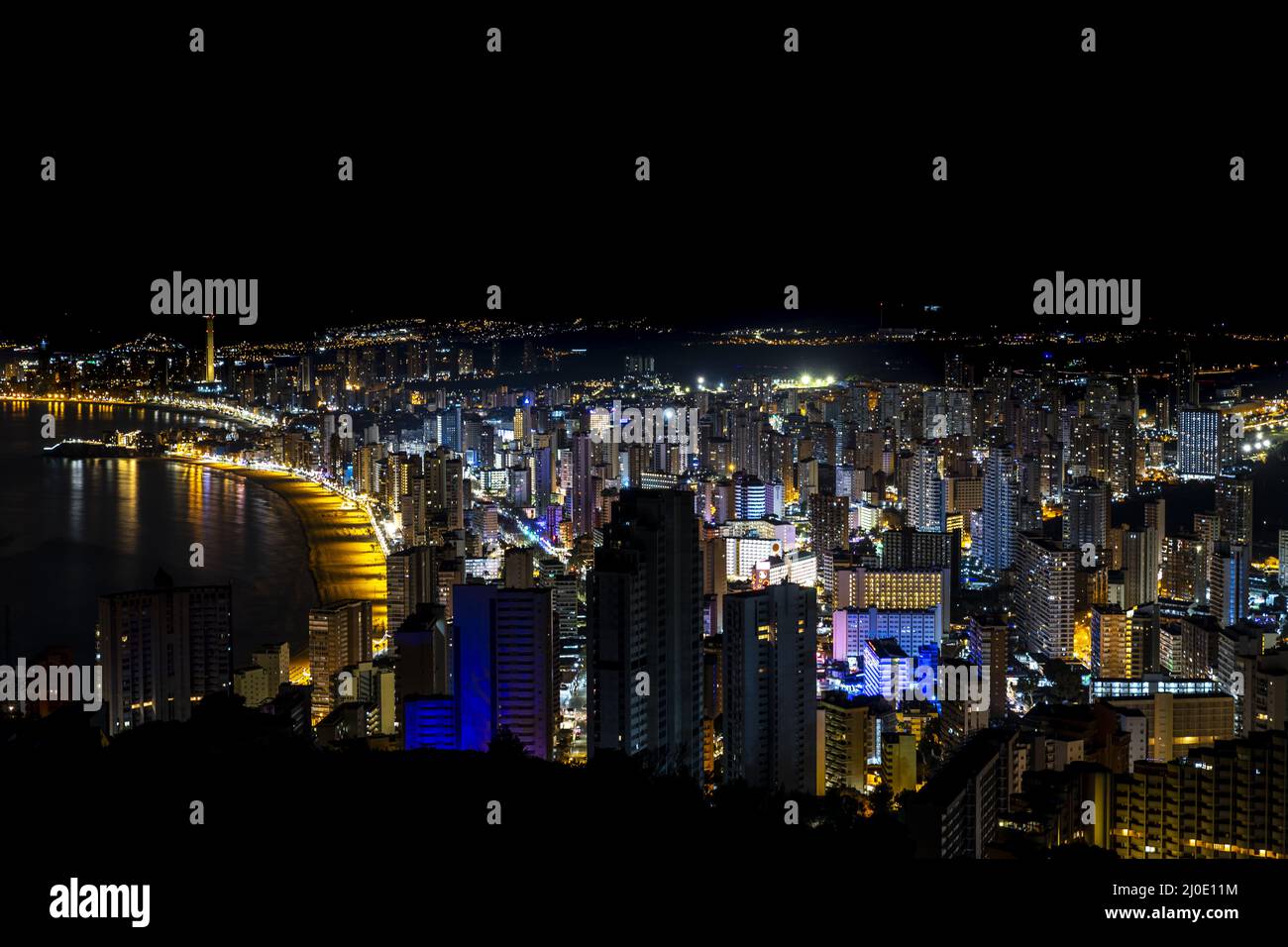 Beautiful night view of a cityscape with tall buildings Stock Photo - Alamy