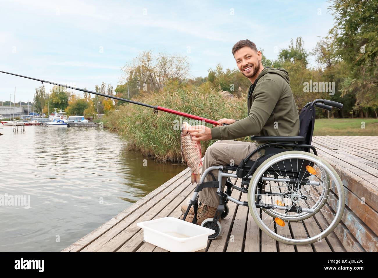 Wheelchair fishing hi-res stock photography and images - Alamy