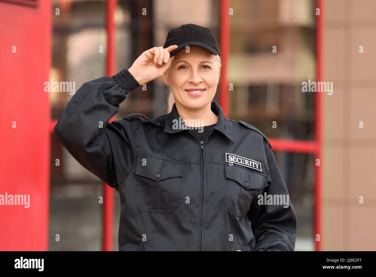 Female security guard outdoors Stock Photo - Alamy