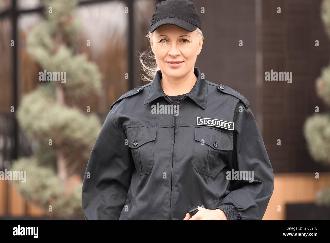 Female security guard outdoors Stock Photo - Alamy