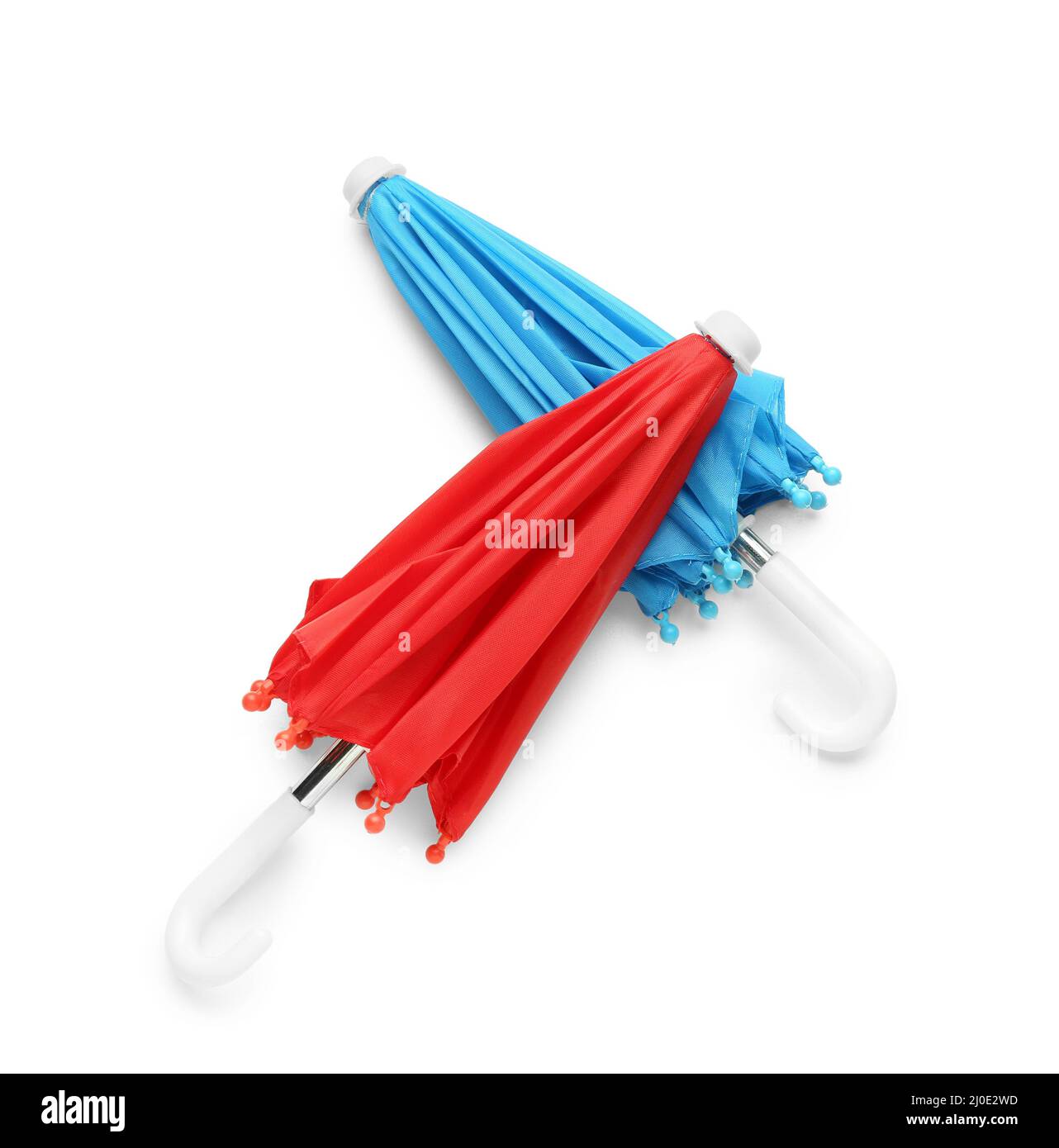 Two umbrellas on white background Stock Photo - Alamy