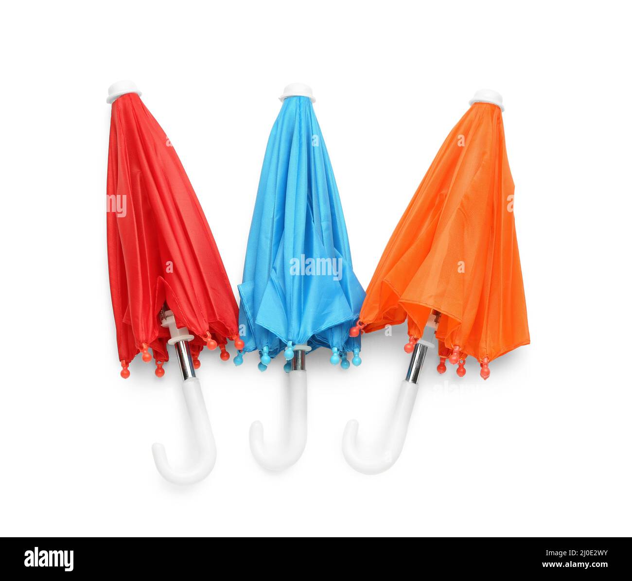 Different umbrellas isolated on white background Stock Photo - Alamy