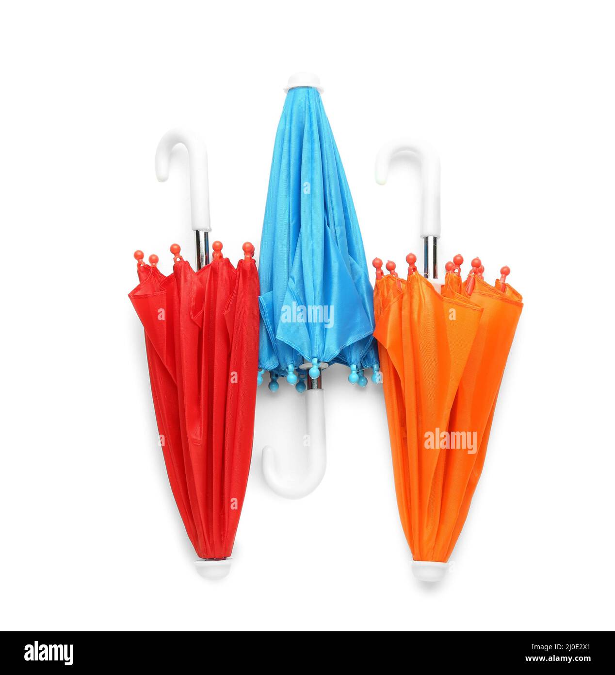 Different umbrellas isolated on white background Stock Photo - Alamy