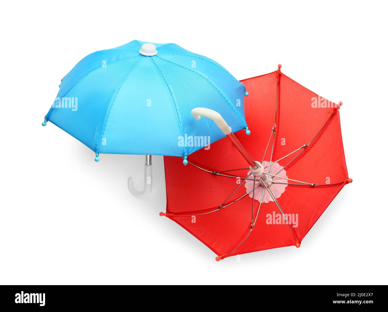 Two open umbrellas on white background Stock Photo - Alamy