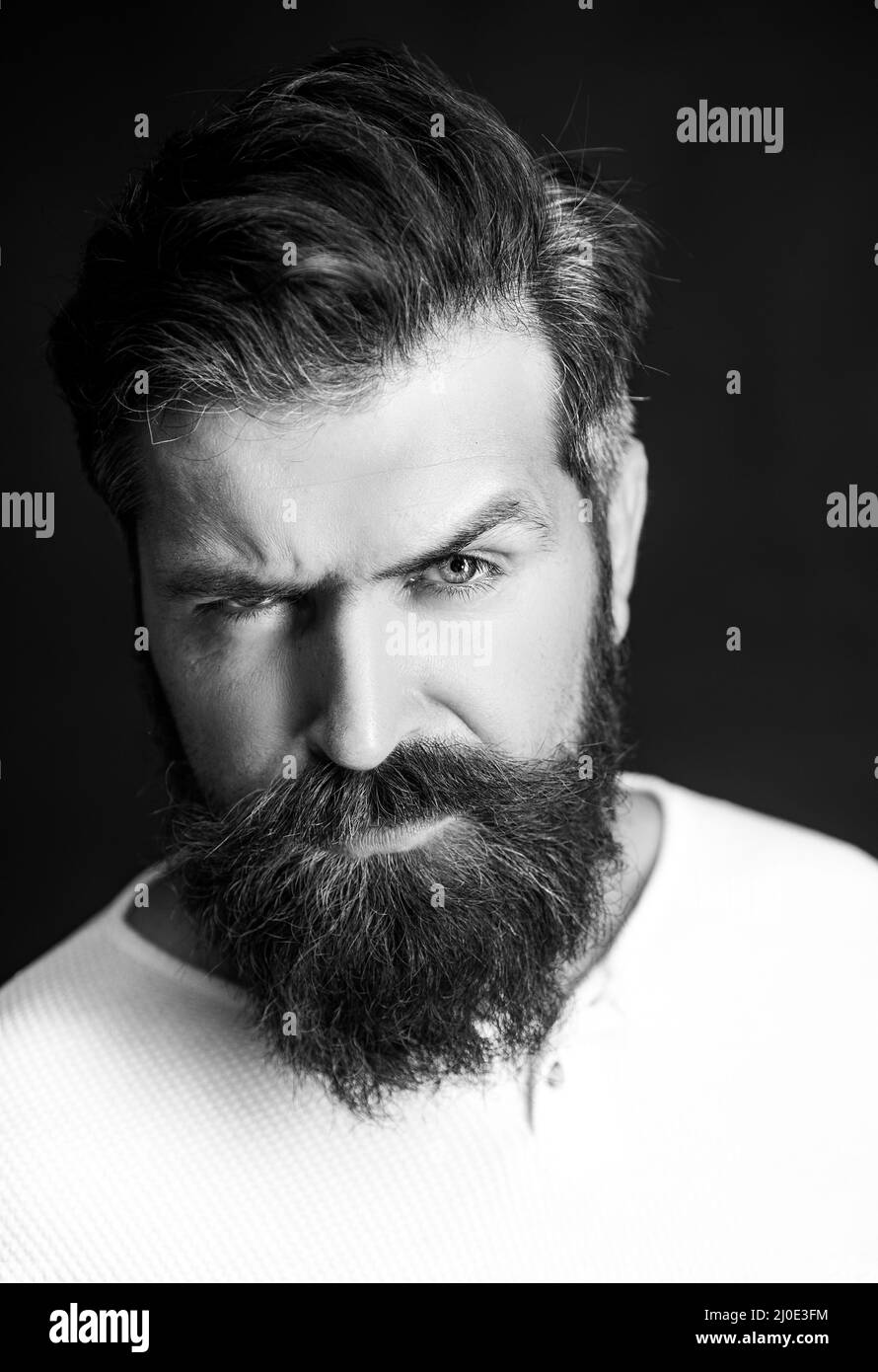 Close-up face of bearded man on black background - professional studio ...