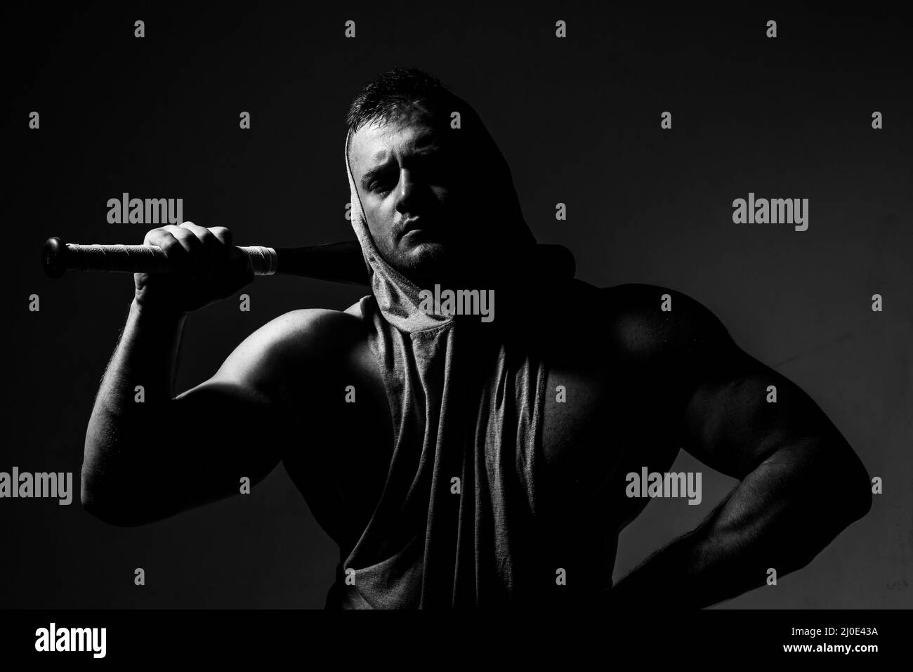 Muscular man baseball bat hi-res stock photography and images - Alamy