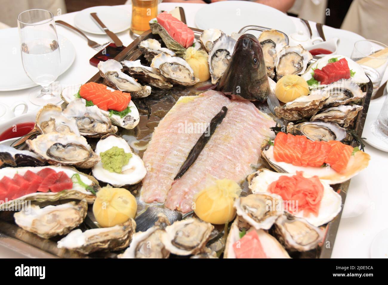 The fresh sibas as main dish in seafood restaurant Stock Photo - Alamy