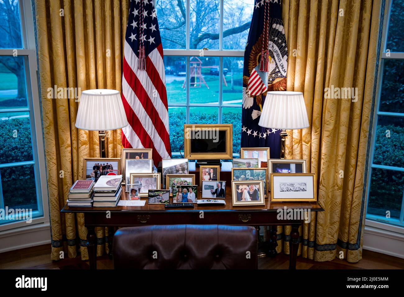 Washington, DC, USA. 17th Mar, 2022. Family photos sit behind the ...