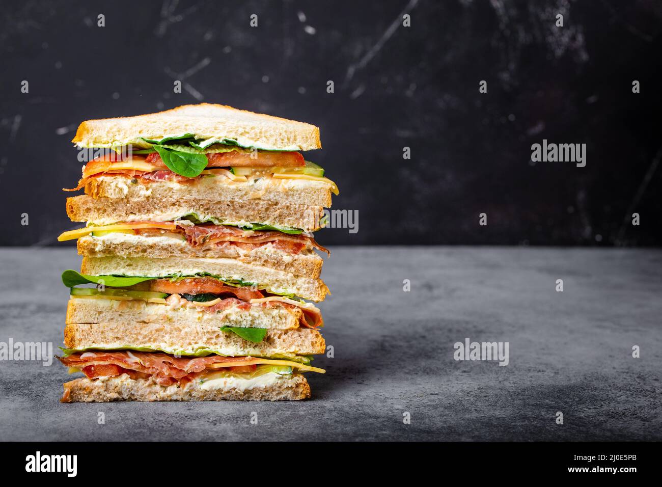 Cut tasty sandwich concept Stock Photo - Alamy