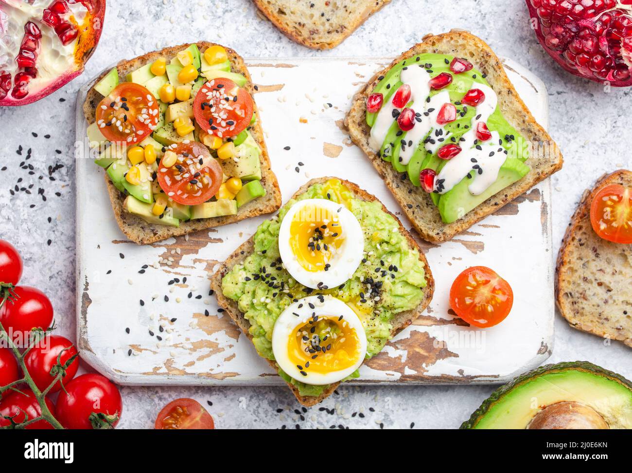 Avocado healthy toasts Stock Photo - Alamy