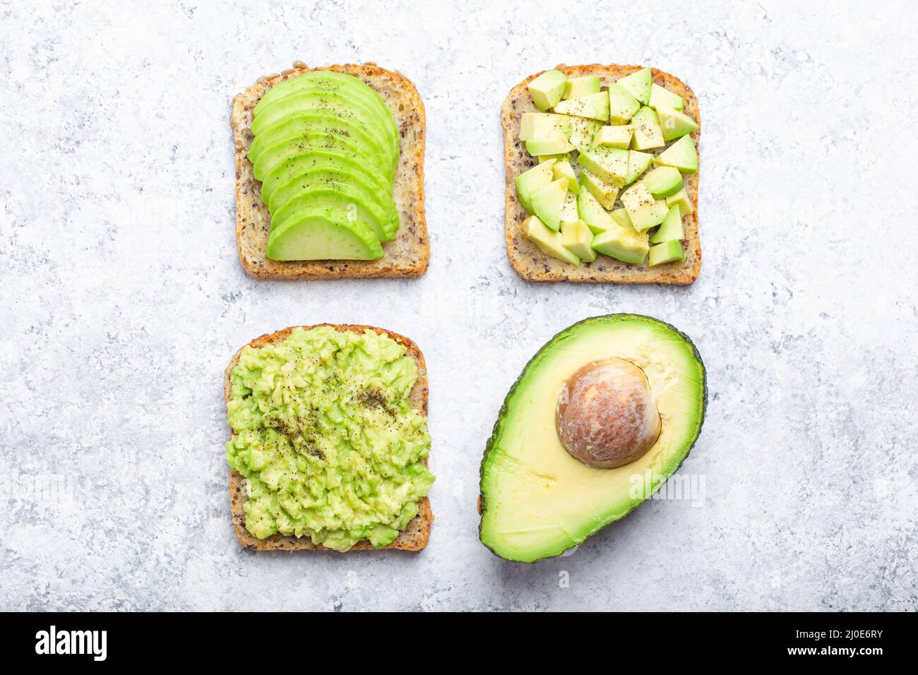 Avocado healthy toasts Stock Photo - Alamy