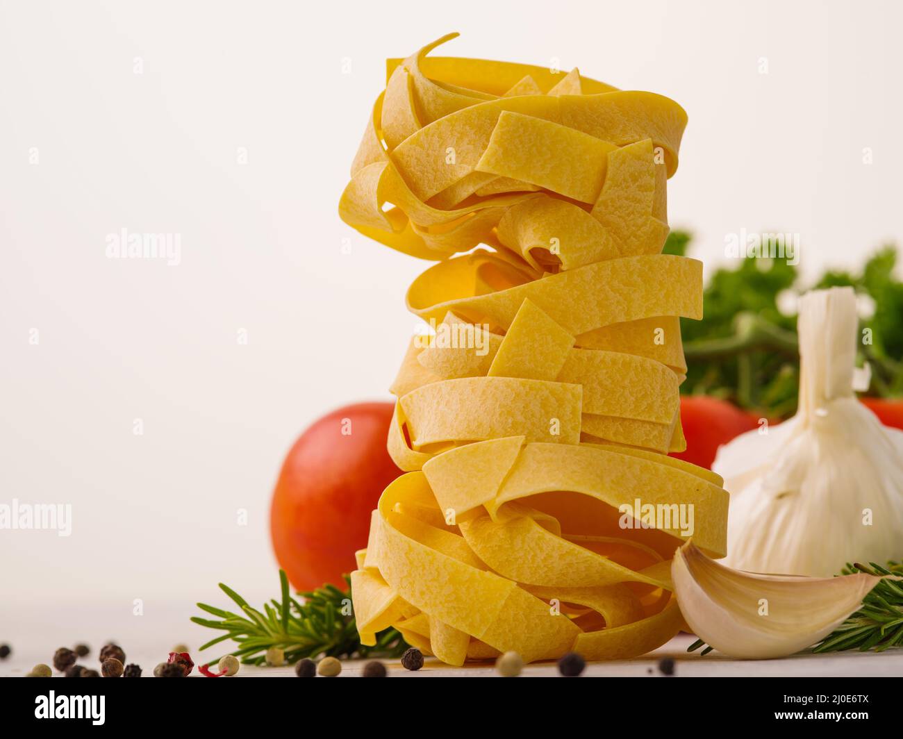 Italian Cuisine. Pasta in an interesting vertical serving, fresh ...