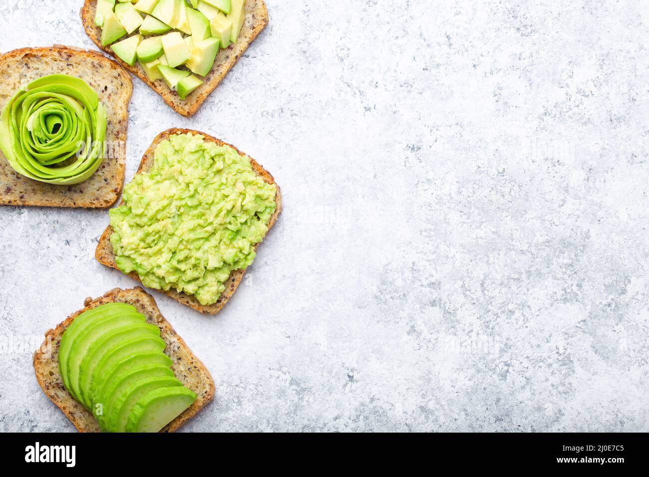Avocado healthy toasts Stock Photo - Alamy
