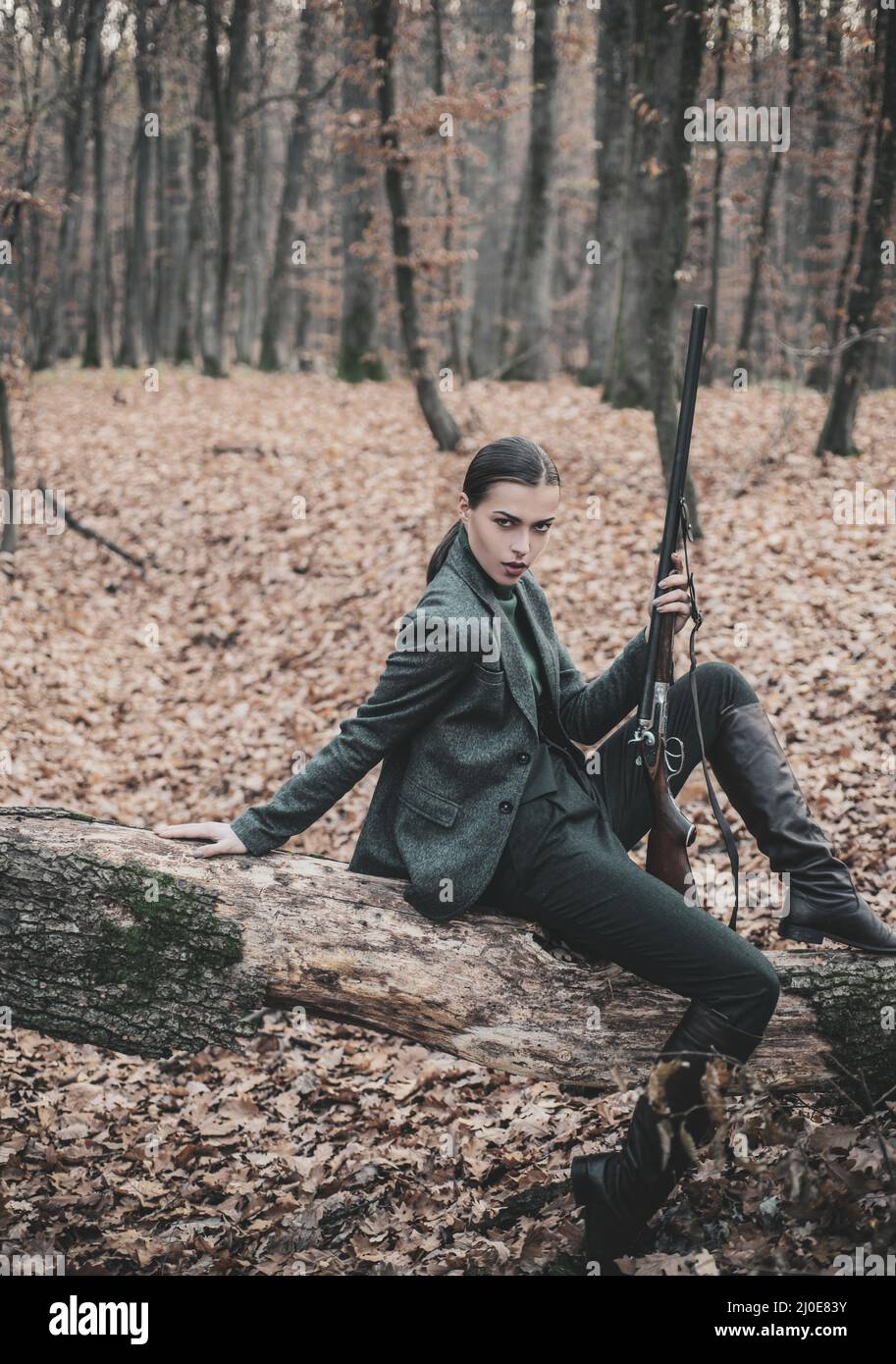 Hunter with shotgun gun on hunt. Hunting in spring forest. Close up ...