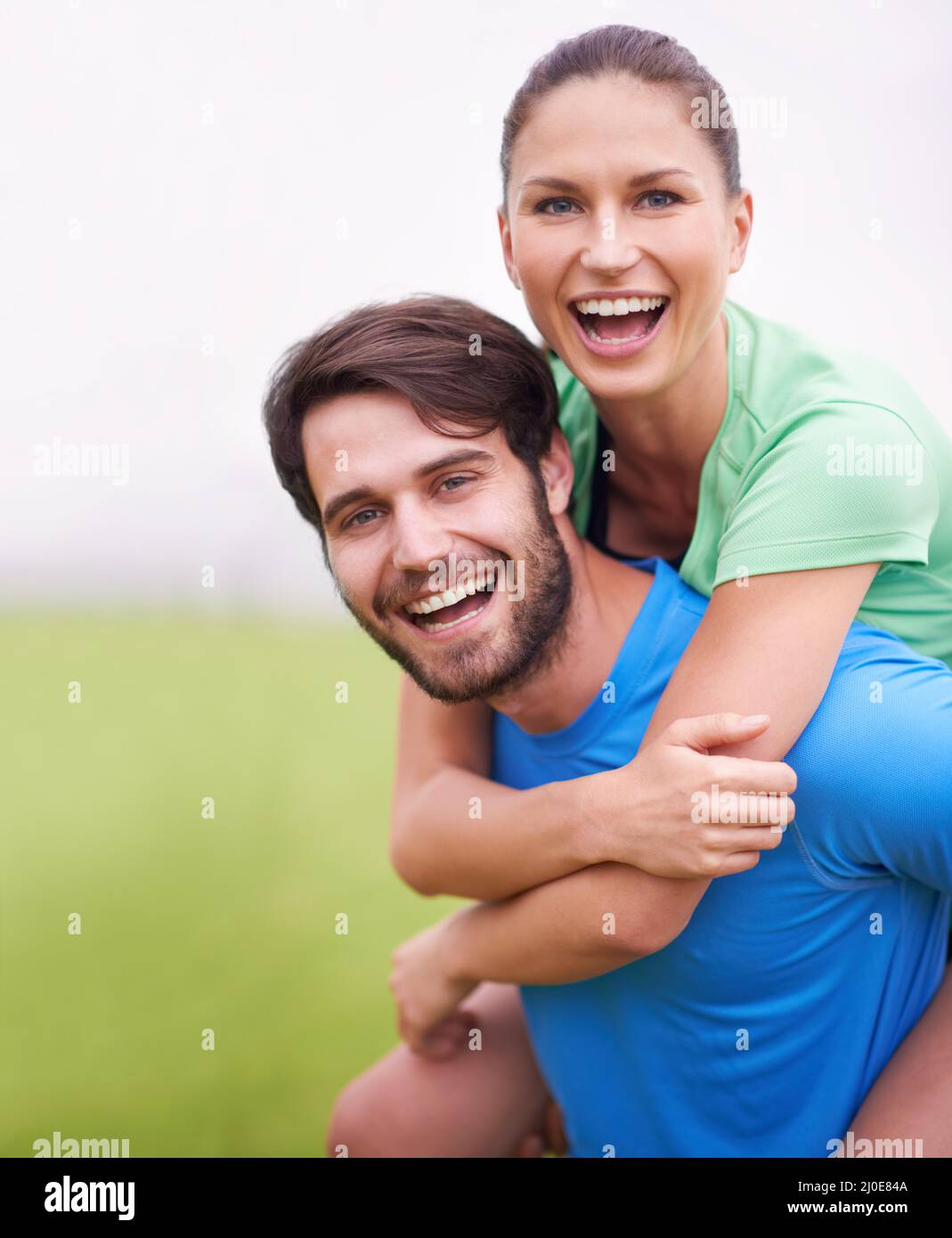 Man carrying girlfriend playfully hi-res stock photography and images ...
