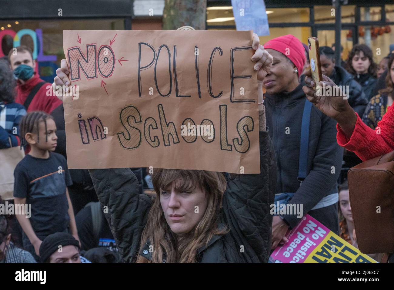 London, UK. 18th Mar 2022. Hackney Cop Watch protesters block the road ...