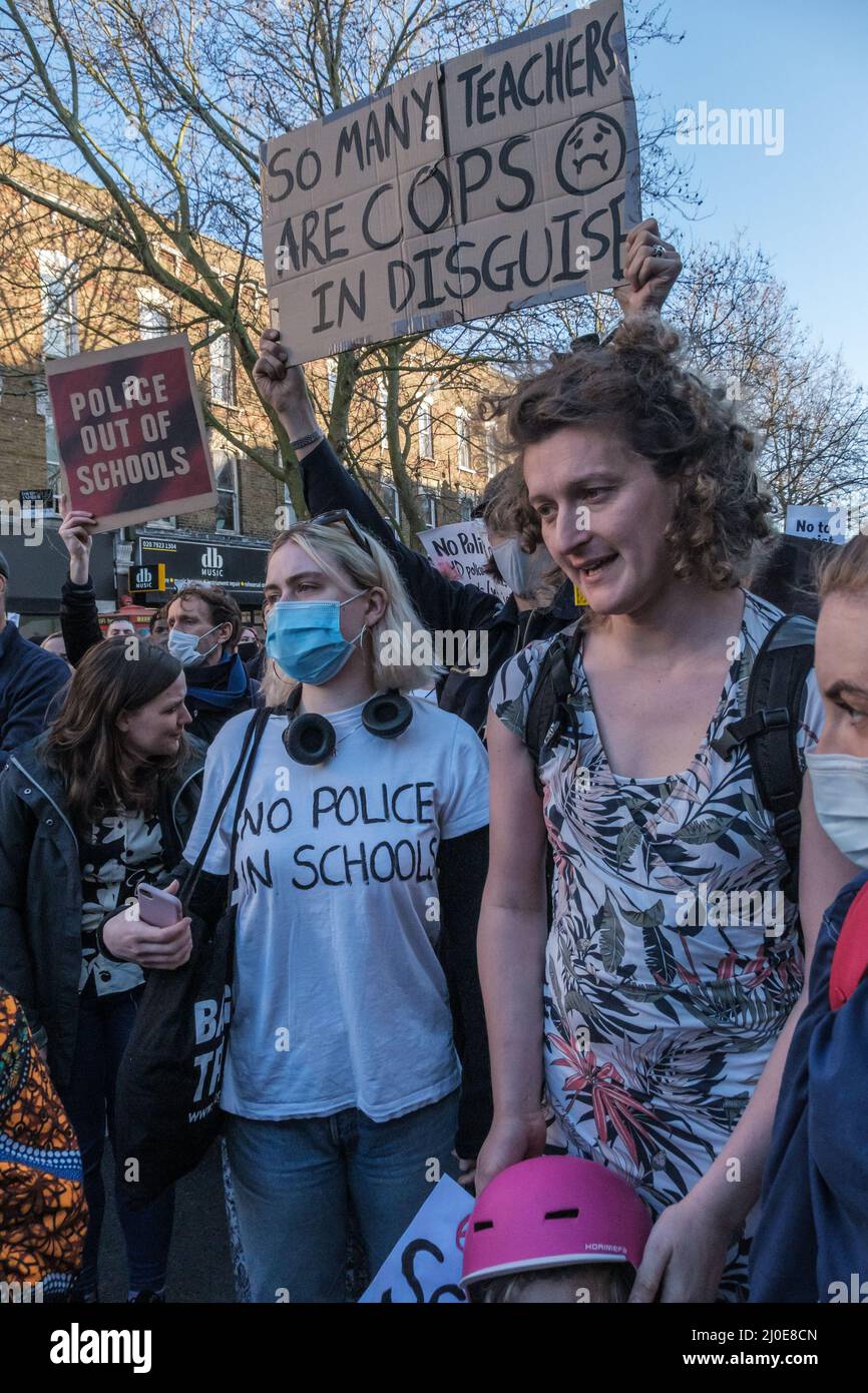 London, UK. 18th Mar 2022. Hackney Cop Watch protesters block the road ...