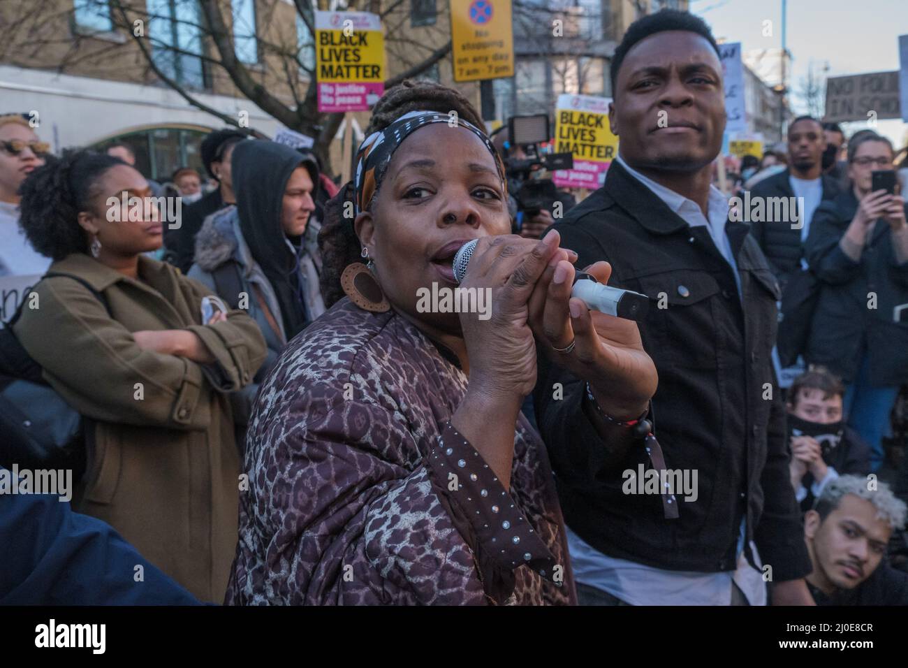 London, UK. 18th Mar 2022. Hackney Cop Watch protesters block the road ...