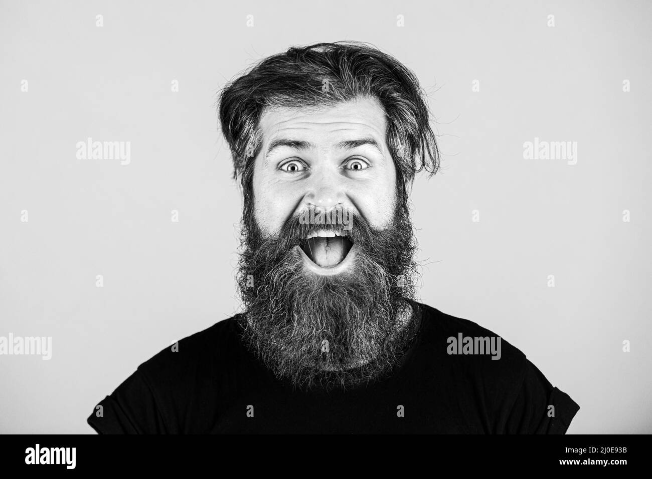Happy man smile face. Handsome smiling young guy with long beard and ...