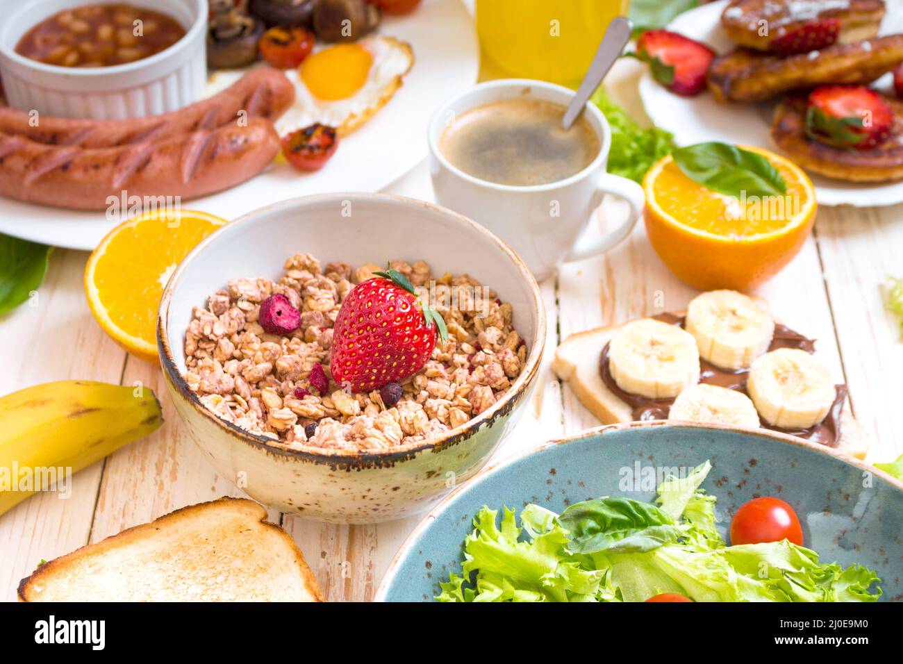 Granola with different types of breakfast or brunch Stock Photo - Alamy