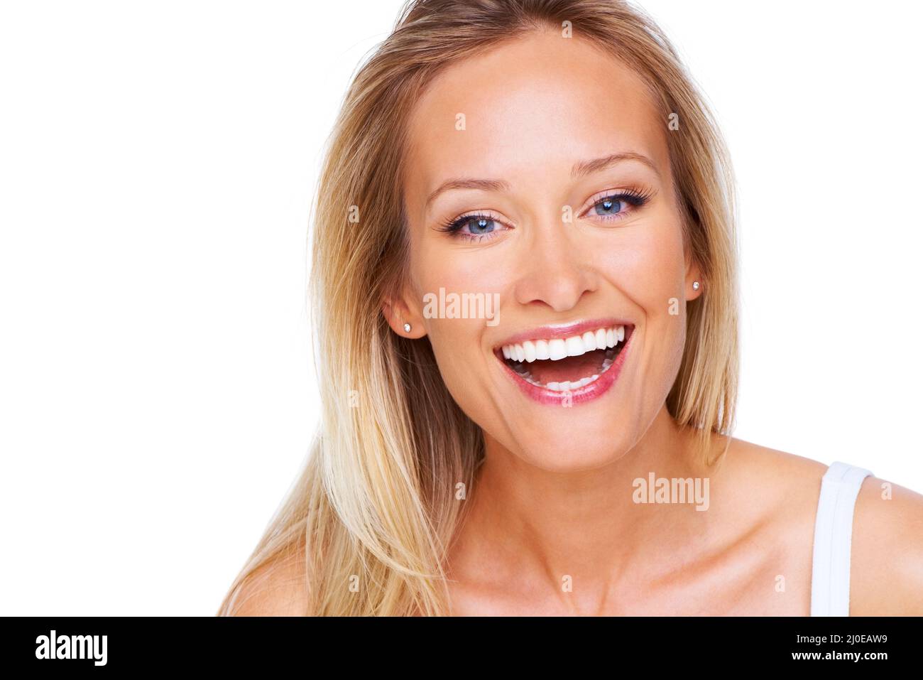 Her positive outlook is so attractive. A gorgeous young woman laughing ...