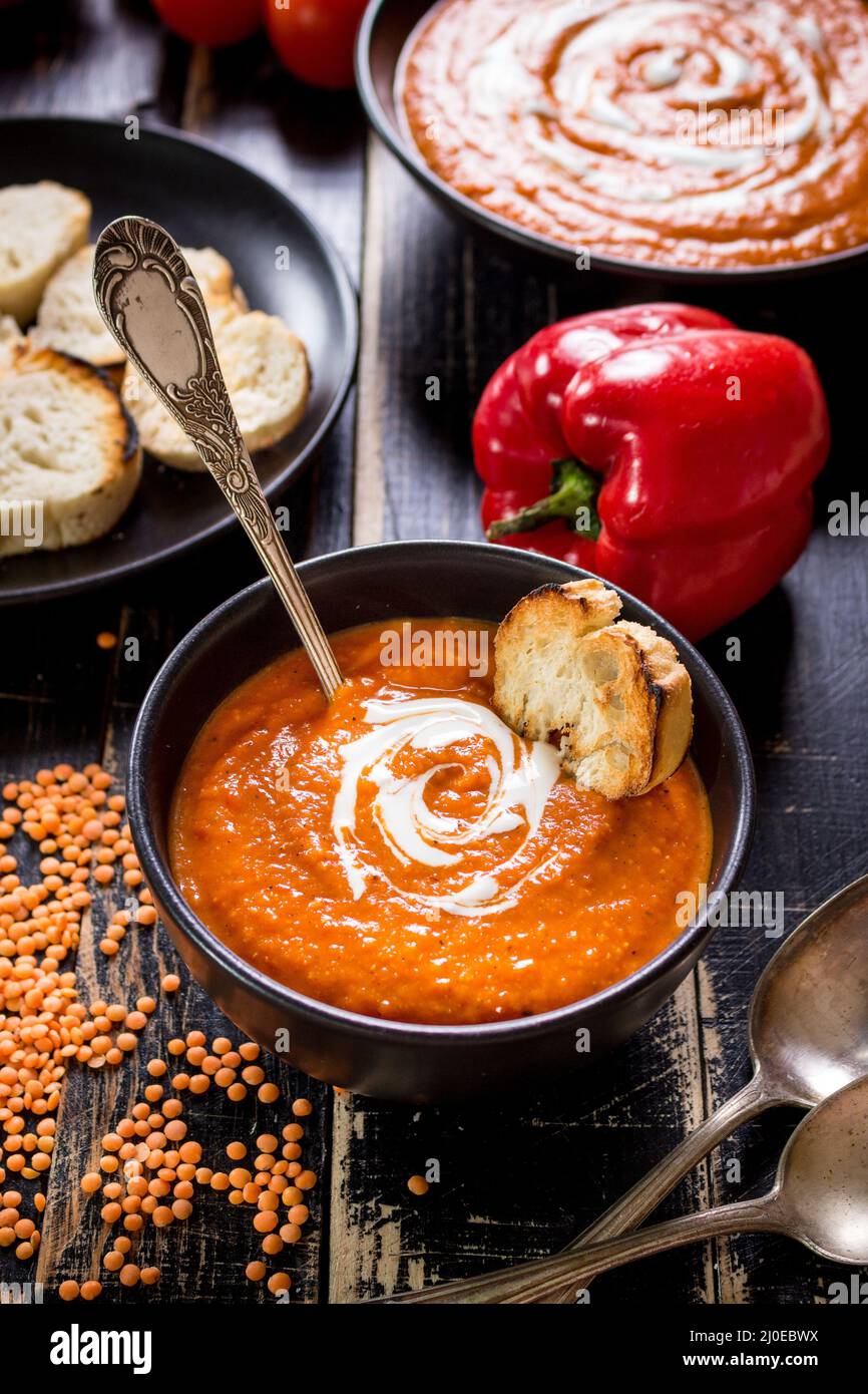 Pumpkin soup with heavy cream Stock Photo - Alamy