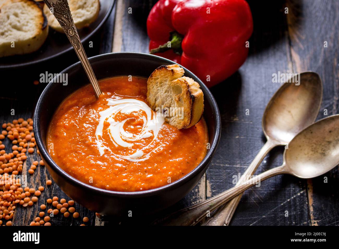 Pumpkin soup with heavy cream Stock Photo - Alamy