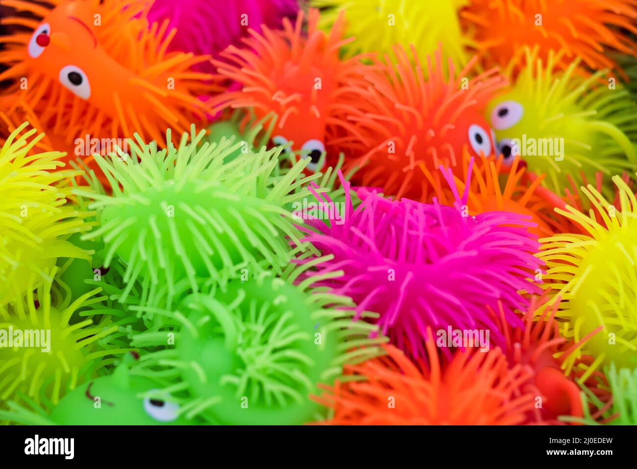 Colorful silicone hedgehog toys - children background, wallpaper Stock ...