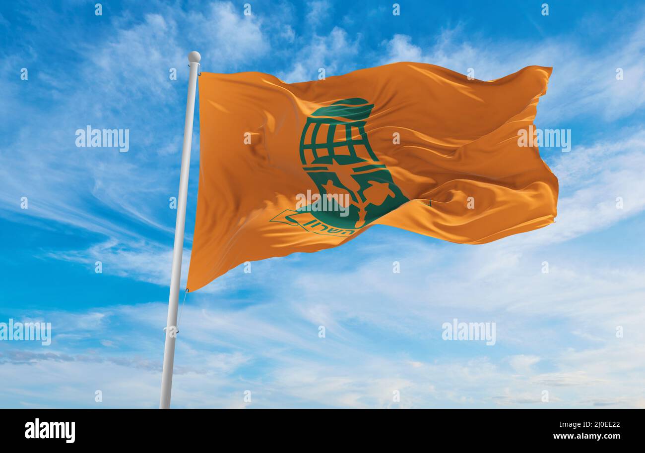 flag of Ramat HaSharon , Israel at cloudy sky background on sunset ...