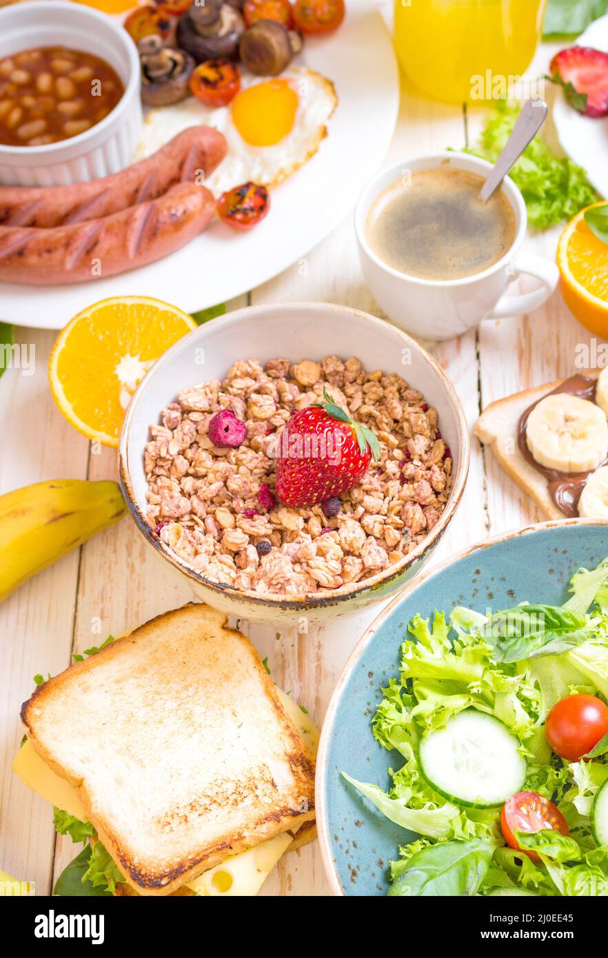 Granola with different types of breakfast or brunch Stock Photo - Alamy