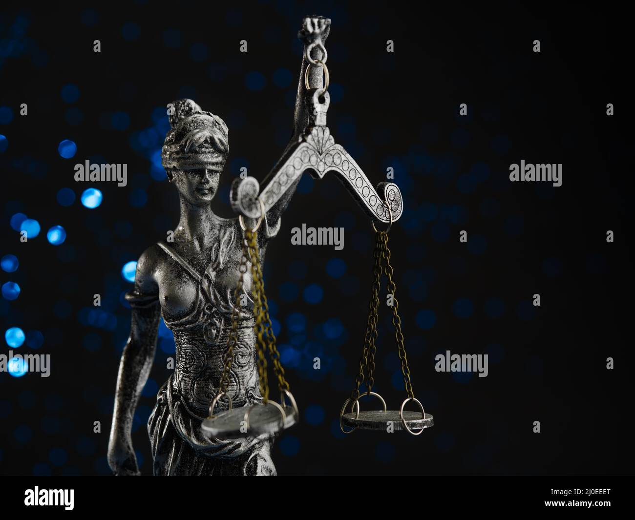 The goddess of justice - Themis on a dark blue background. Law, justice ...
