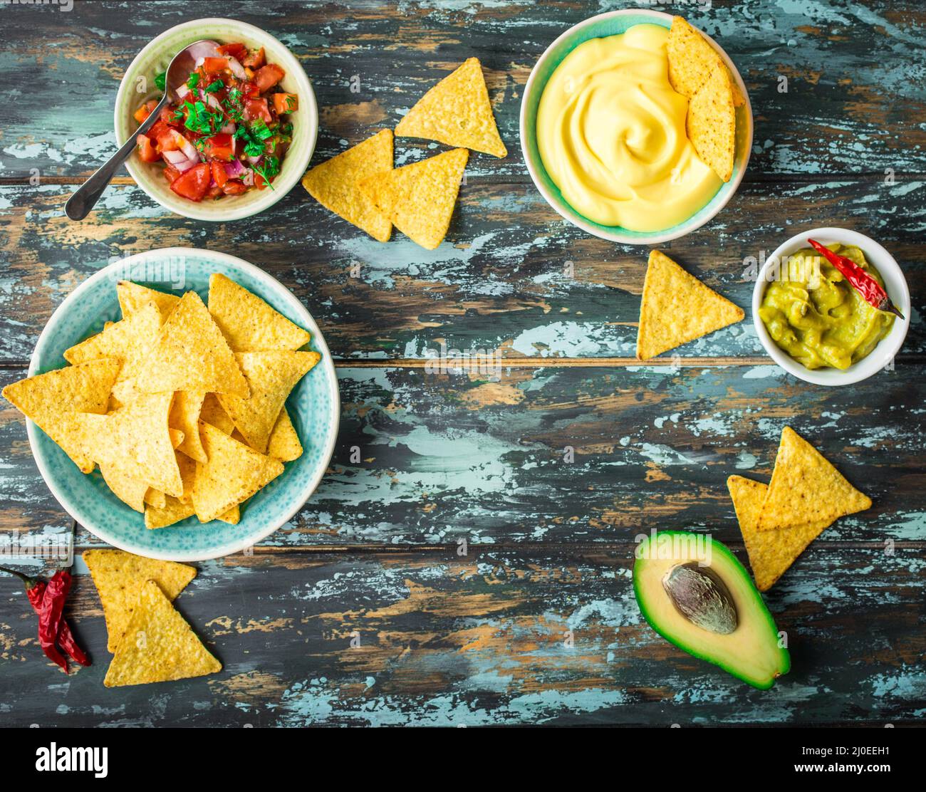 Tortilla chips and assorted dips Stock Photo - Alamy