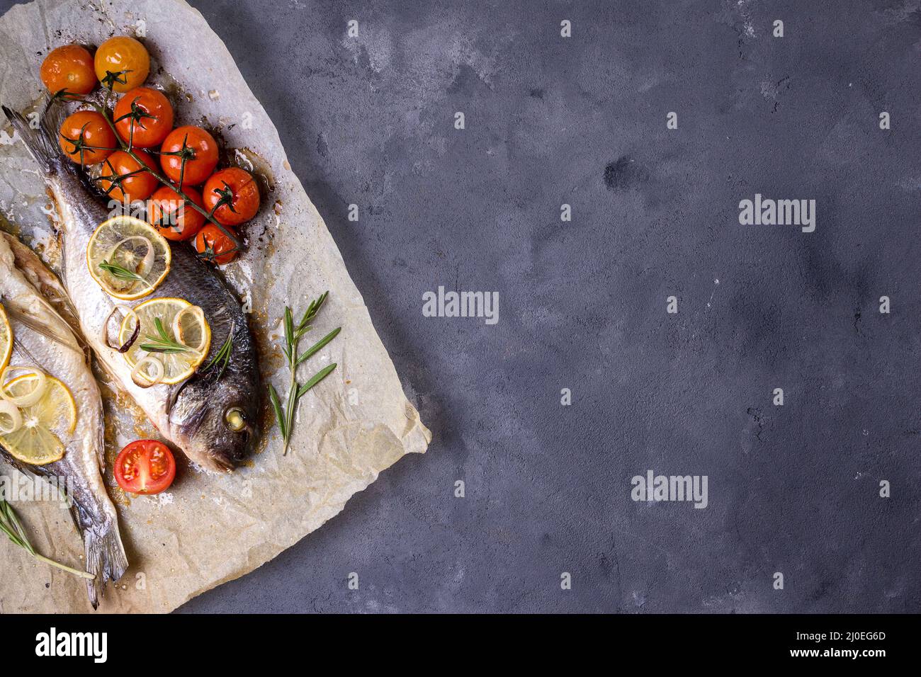 Baked fish background Stock Photo - Alamy